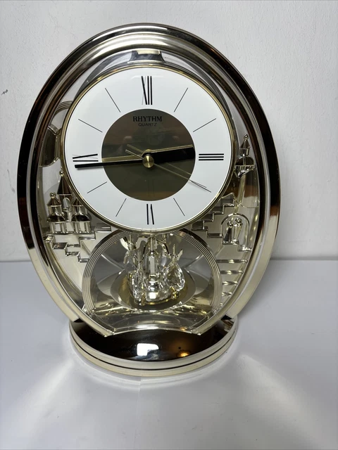 RHYTHM QUARTZ GOLD Oval Mantle Clock With Shooting Star Pendulum £40.00 ...