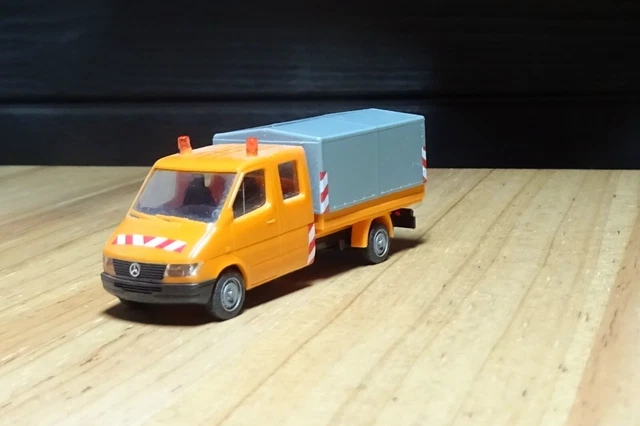 HERPA MERCEDES-BENZ SPRINTER Kommunal Pritsche mit Plane, orange, 1/87 ...