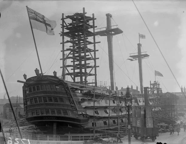 NELSON'S SHIP HMS Victory in dry dock but still flying the ensign Old ...