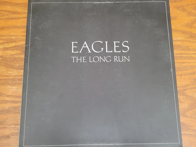 THE EAGLES THE Long Run vinyle Record très bon état + autocollant de ...