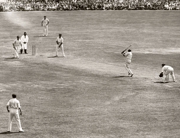 ENGLAND CRICKETER LES Ames hits Australian bowler Clarrie Grimmett ...