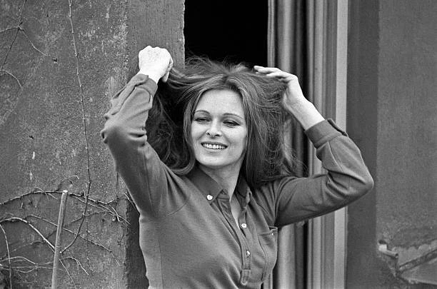 ITALIAN ACTRESS LUCIA Bos, born Lucia Borloni, stands on the terra ...