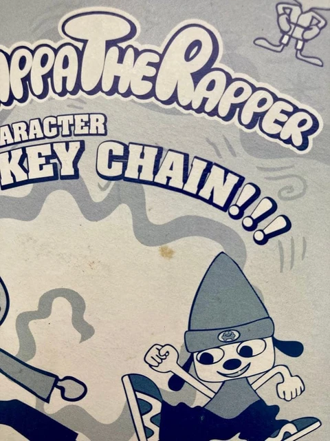 RARE PARAPPA THE Rapper triple keychain. Package has discoloration ...