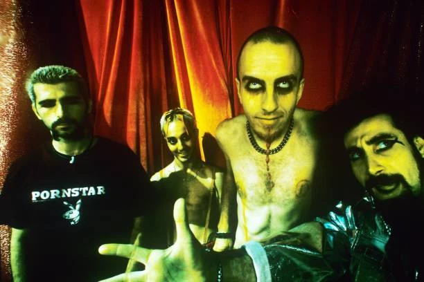 SYSTEM OF A Down, drummer John Dolmayan, guitarist Daron Malakian ...