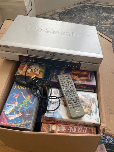 VHS PLAYER IN good working order and a big box of children's VHS tapes ...