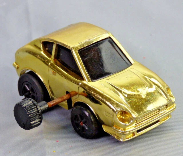 KNICKERBOCKER NISSAN DATSUN 240Z Wrist Racer Wind up Stunt Car Toy Gold ...