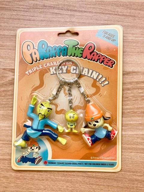 RARE PARAPPA THE Rapper triple keychain. Package has discoloration ...