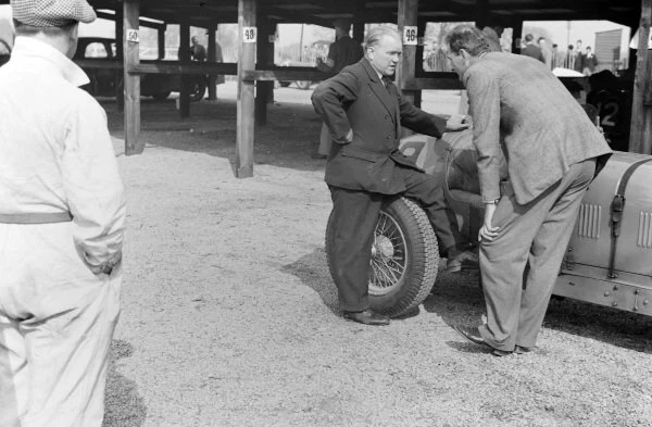 FREDDIE DIXON SITS on the rear wheel of Tony Rolt's ERA 1939 Racing Old ...