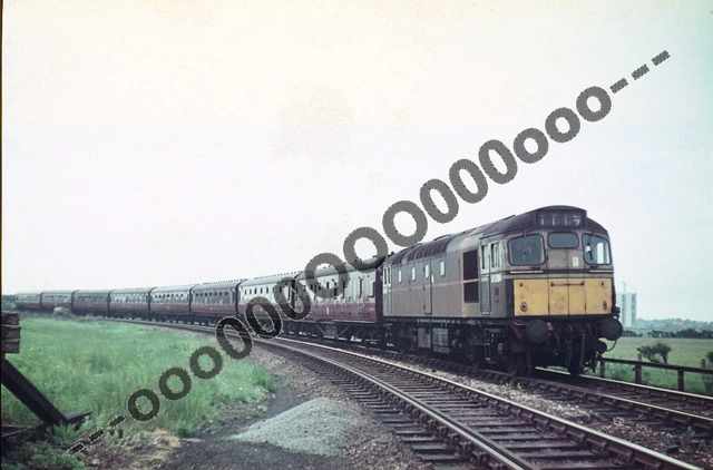 35MM ORIGINAL COLOUR SLIDE OF CLASS 27 AT BIDSTON IN SUMMER 1965. £23. ...