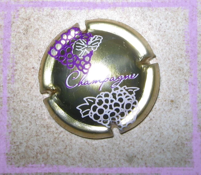 CAPSULE DE CHAMPAGNE générique or avec grappes blanches et violettes ...
