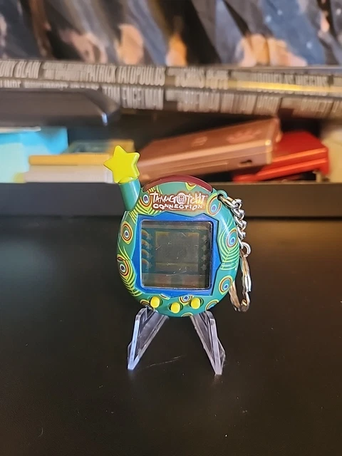 VINTAGE TAMAGOTCHI CONNECTION Peacock Feathers Green Yellow Star V4.5 ...