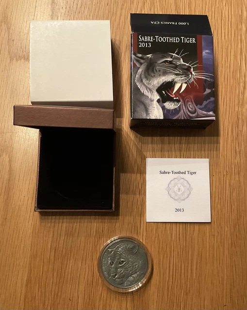 SMILODON SABER TOOTHED Tiger, Baby, 1 Oz Silver Burkina Faso, 1000 ...