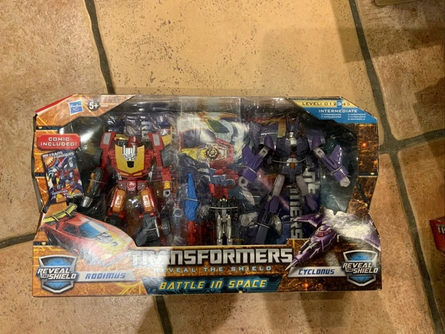 TRANSFORMERS BATTLE IN Space Rodimus vs Cyclonus RTS rivela lo scudo ...