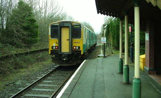 RAILWAY PHOTO CLASS 150 DMU 6x4 Llangunllo - the train now departing ...