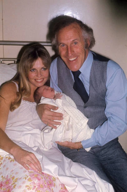 BRUCE FORSYTH VISITS his wife Anthea Redfern and their new dau- 1977 ...