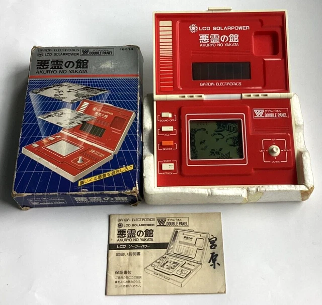 VINTAGE 1982 BANDAI EVIL MANSION Clamshell Solar LCD game (Very good ...