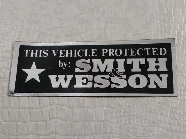 VINTAGE THIS VEHICLE Protected by Smith & Wesson Black Silver Car ...