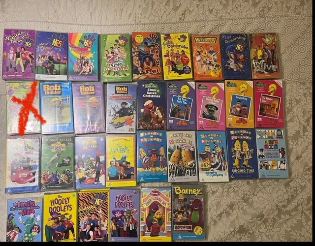 A COLLECTION OF classic VHS tapes featuring beloved children's shows ...
