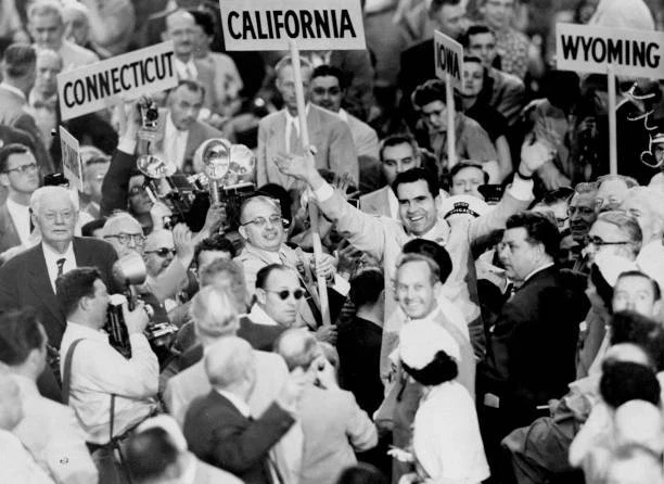 SEN RICHARD NIXON stands among campaign signs at GOP Convention in ...