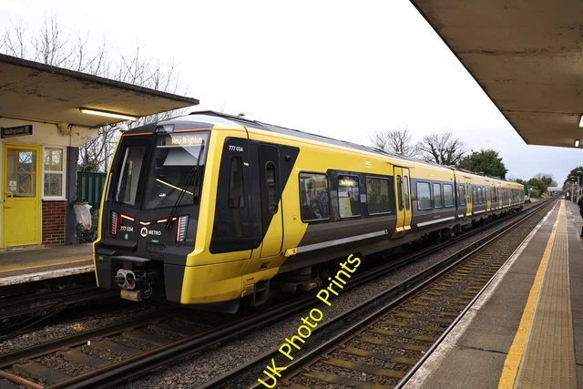 PHOTO RAILWAY 6X4 Class 777 EMU 777034 waits to depart Wallasey Village ...