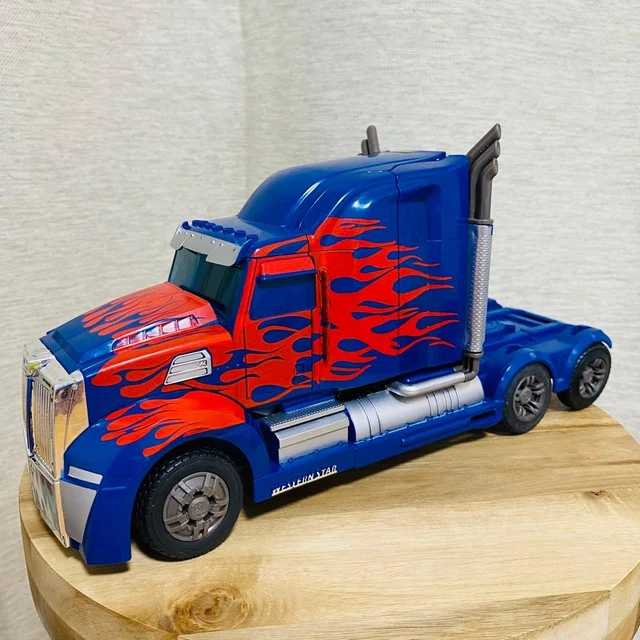 TRANSFORMERS STUDIO SERIES Optimus Prime Figura con Colección de Armas ...