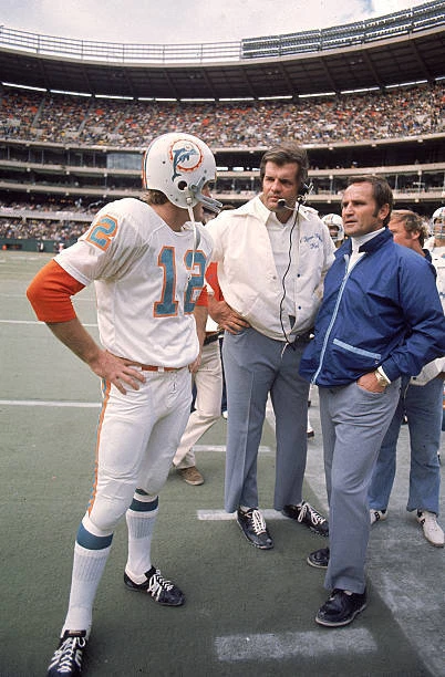 MIAMI DOLPHINS HEAD coach Don Shula talking to QB Bob Griese - 1972 Old ...