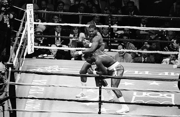 DONOVAN RUDDOCK LANDS A Punch Against Mike Rouse 2 Old Boxing Photo £5. ...