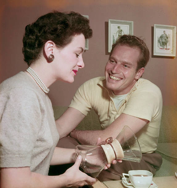 CHARLTON HESTON SHARES a laugh with his wife actress Lydia Cla- 1950s ...