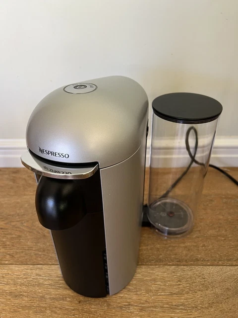 NESPRESSO VERTUO PLUS Deluxe Round Top Coffee Machine plus Extras $150. ...
