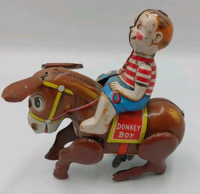 VINTAGE HAJI LITHO Wind Up Tin Toy Boy On Donkey (Needs TLC) (K47) £19. ...
