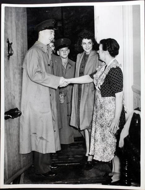 AMERICAN SOLDIERS BID farewell their hostess, Mrs Rees Evans Finch ...