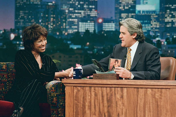 MUSICAL GUEST NATALIE Cole during an interview with host Jay Leno- Old ...