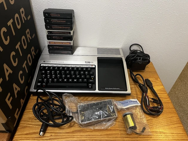 TEXAS INSTRUMENTS TI99/4A computer original Has 8 games/cords Powers on ...