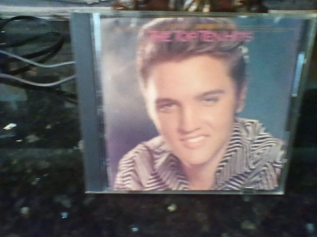 ELVIS PRESLEY &THE TOP TEN HITS" (CD 1988 BMG) 19 Tracks £0.74 ...