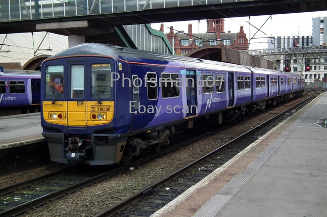 CLASS 319 319386, 4 car EMU, in Northern Electrics at Manchester Oxford ...