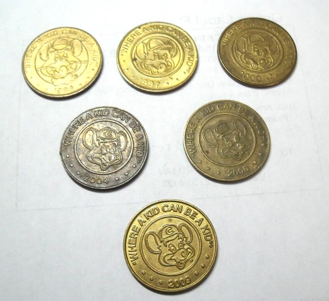 6 CHUCK E CHEESE TOKENS 1994 - 2009 COUPLE UNCIRCULATED Tokens EUR 5,33 ...
