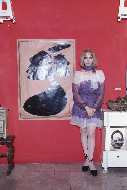 ITALIAN ACTRESS MARIANGELA Melato, wearing a violet and white dres ...