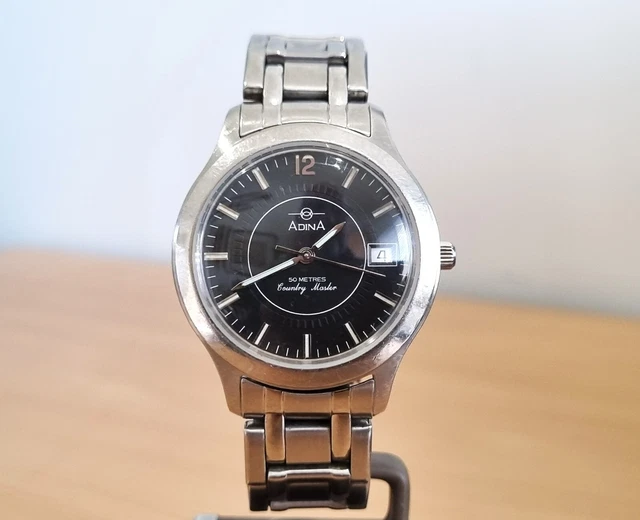 ADINA COUNTRY MASTER SS black dial, date, SS bracelet quartz watch. $27 ...