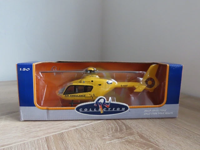 REALTOY EUROCOPTER EC135 Air Ambulance Helicopter (Yellow) 1:50 Diecast ...