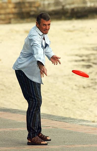 AUSTRALIAN ACTOR TONY Bonner throwing a frisbee on the set of the - Old ...