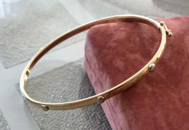 9CT GOLD BANGLE with screw design cuff fully hallmarked. 3.5 grams £99. ...