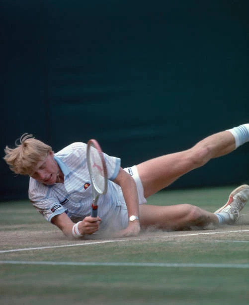 BORIS BECKER OF West Germany takes a tumble enroute to winning th - Old ...