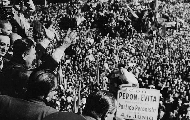 GENERAL JUAN PERON , Dictator of Argentina, raising his arms as- 1955 ...