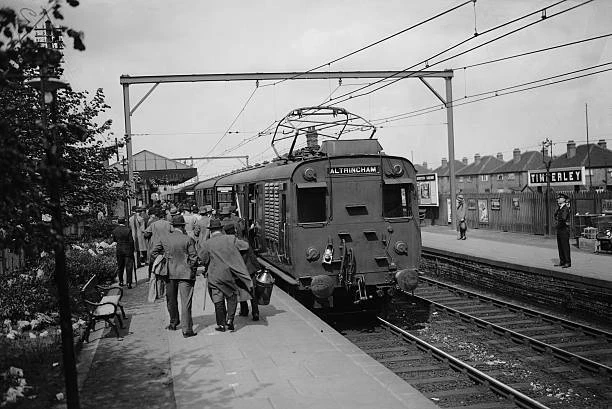 PASSENGERS BOARDING A New Electric Train Timperley Station Greater Ma ...