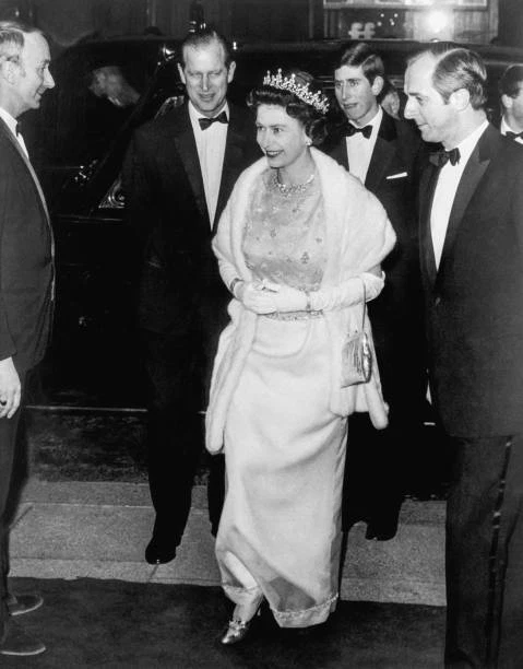 QUEEN ELIZABETH FOLLOWED by Prince Philip Prince Charles as ar- 1968 ...
