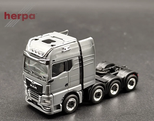 HERPA H0 1/87 - MAN TGX GX 37.580 8x4 Zugmaschine, nardograu - 958233 ...