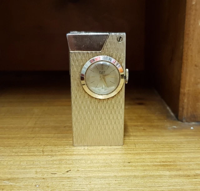 VINTAGE RIVO SWISS made lift arm cigarette lighter 17 jewel clock no ...