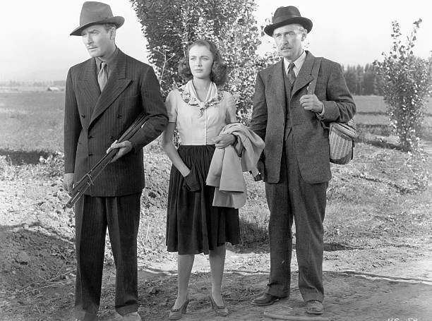 PAUL LUKAS, JEAN Sullivan and Errol Flynn star in Uncertain Glory,- Old ...