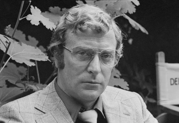 ENGLISH ACTOR MICHAEL Caine pictured on location during shooting of ...