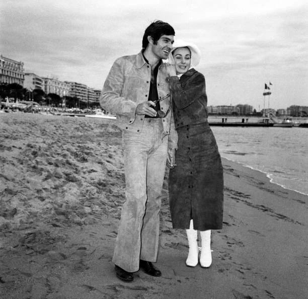 GENEVIEVE GRAD AND Luc Merenda on a beach during the Cannes Film F- Old ...
